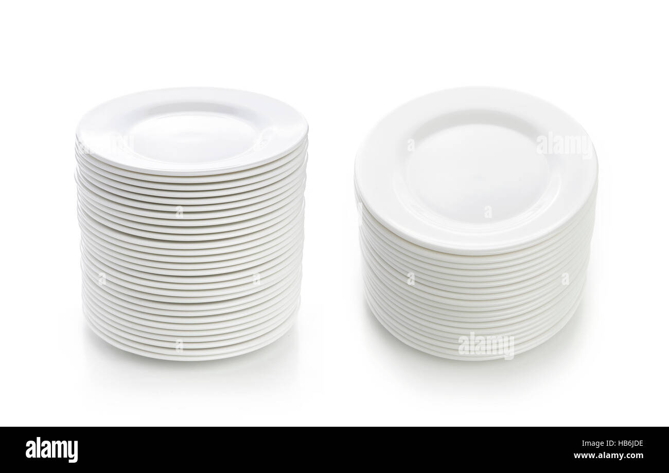 Stack of plates isolated on white background Stock Photo - Alamy