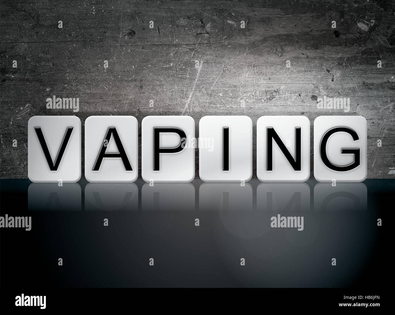 The word "Vaping" written in white tiles against a dark vintage grunge ...