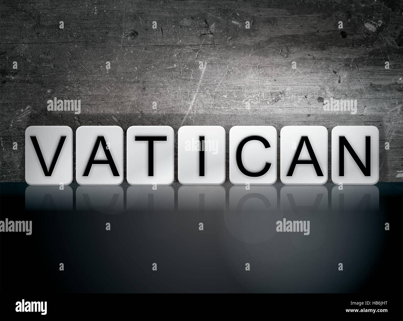 The word "Vatican" written in white tiles against a dark vintage grunge ...