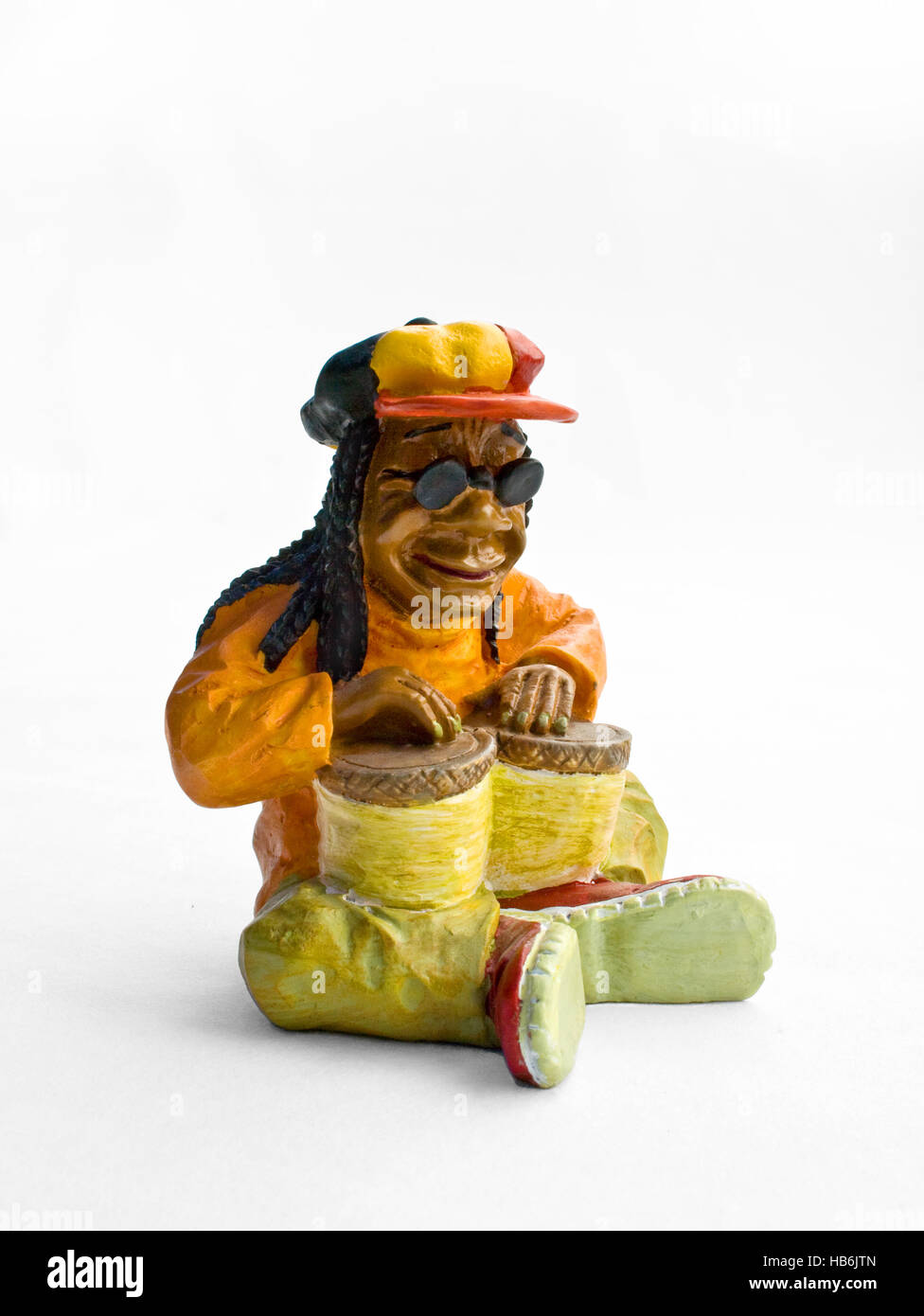 Rastafarian Reggae Musician playing Bongo drums Stock Photo - Alamy