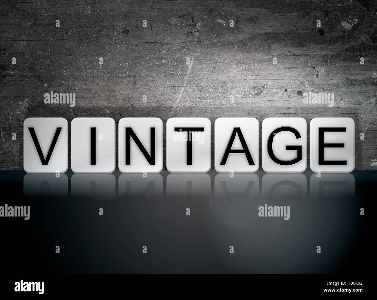 The word "Vintage" written in white tiles against a dark vintage grunge ...