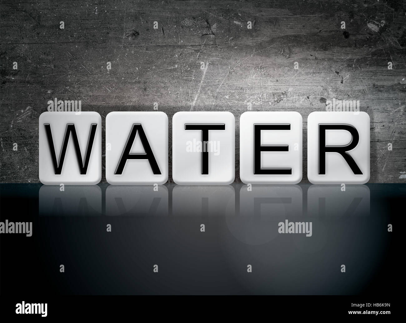 The word "Water" written in white tiles against a dark vintage grunge ...