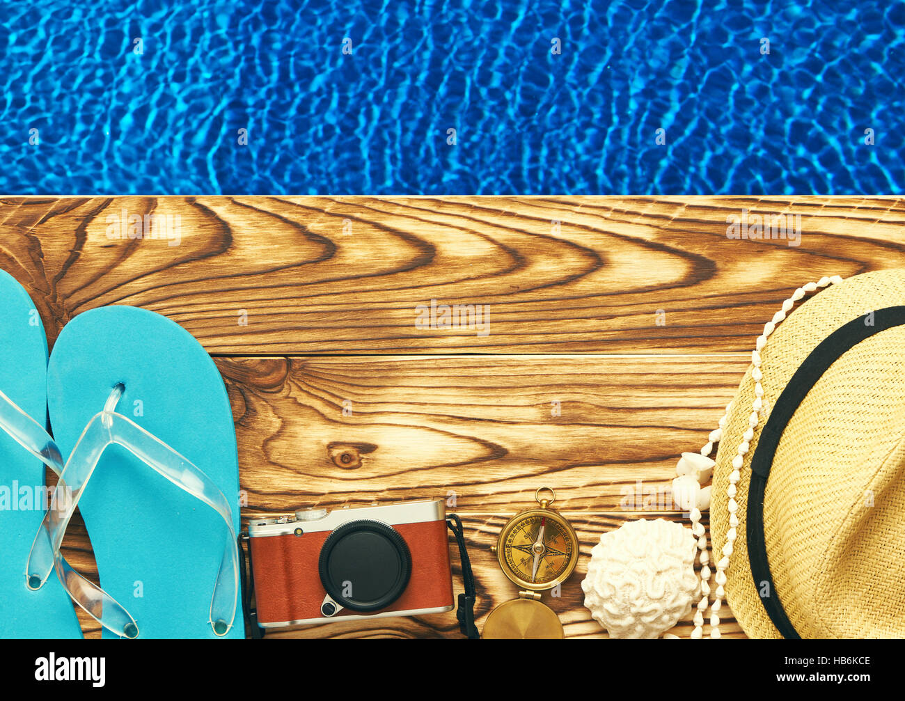 Beach items at pool Stock Photo - Alamy
