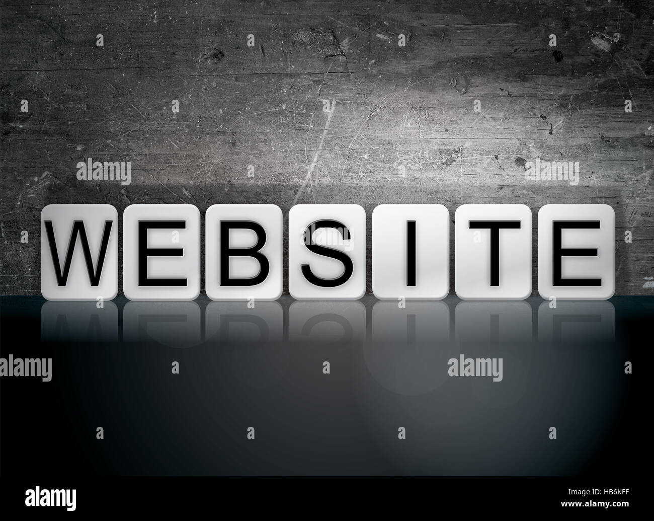 The word "Website" written in white tiles against a dark vintage grunge ...