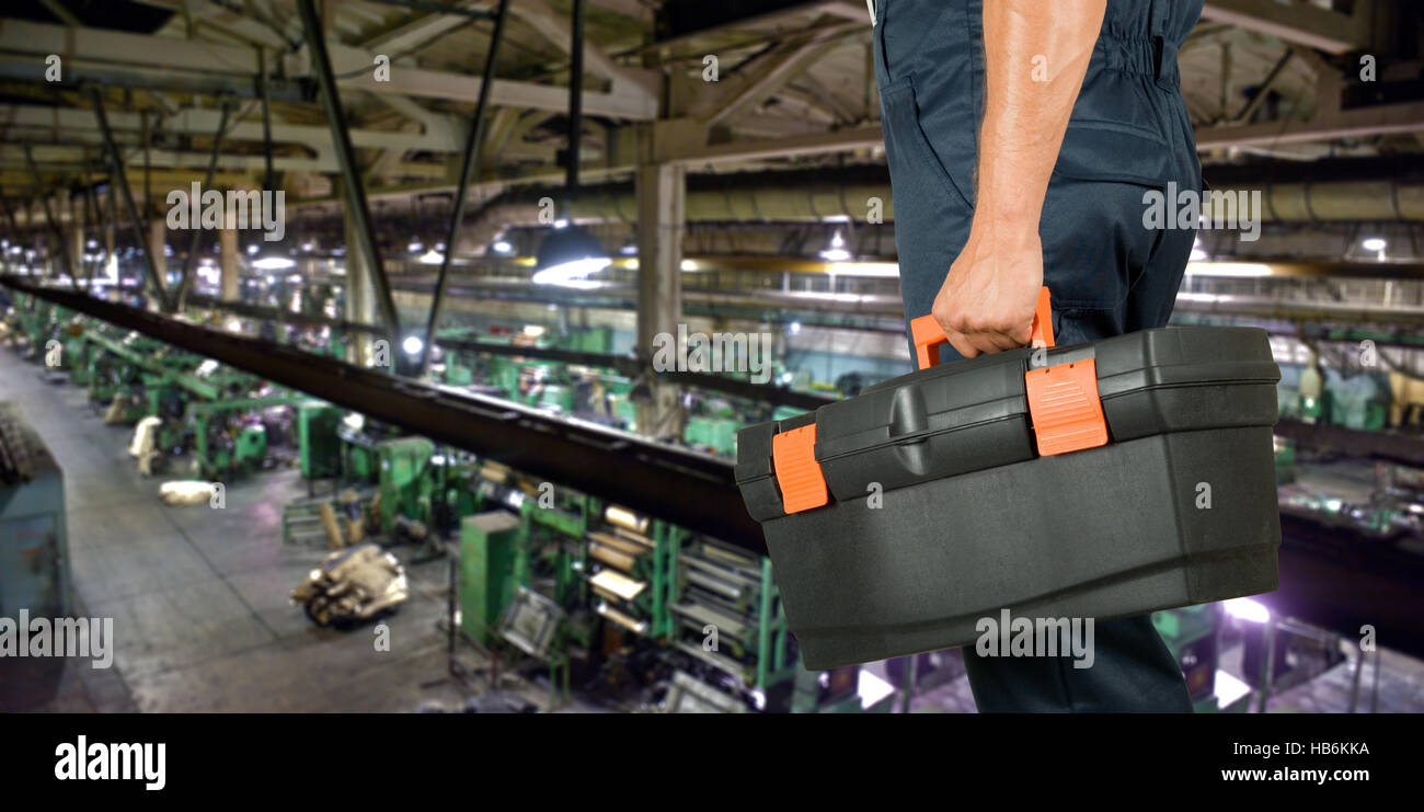 Worker with instruments Stock Photo - Alamy