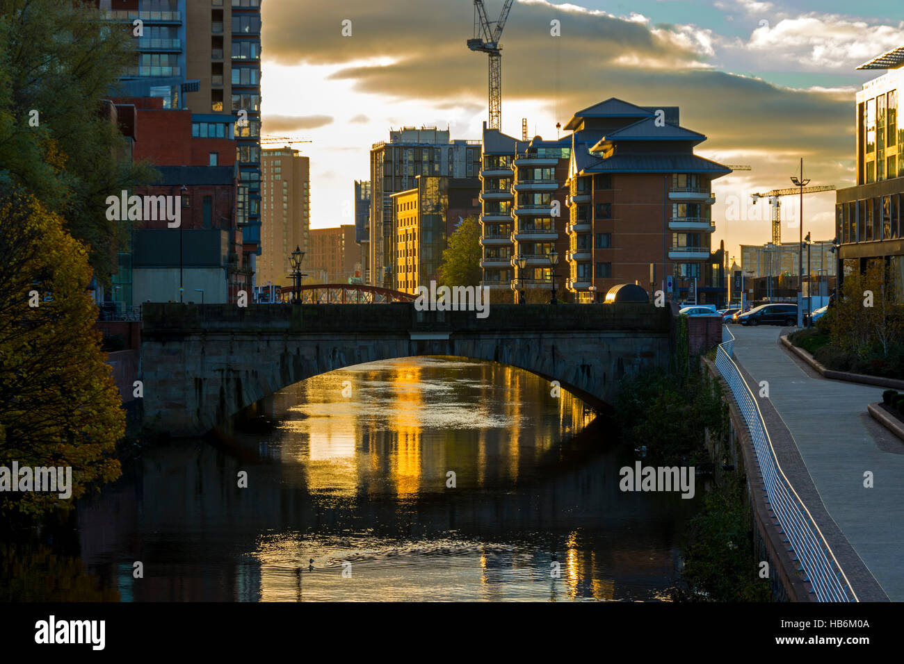 The river Irwell and the Bridge Street bridge at sunset, from Trinity ...