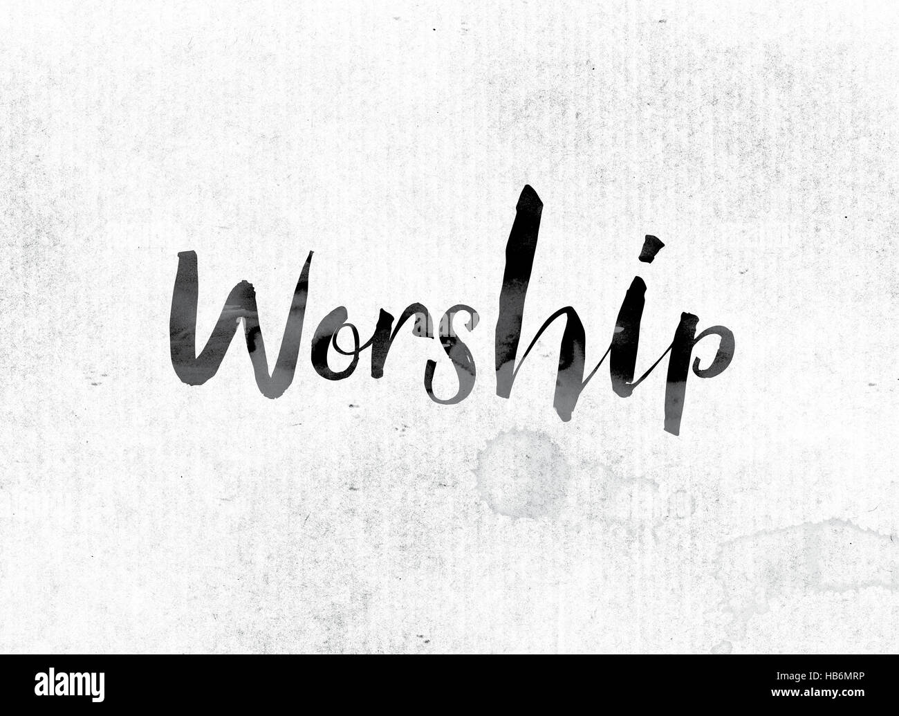 The word "Worship" concept and theme painted in watercolor ink on a ...