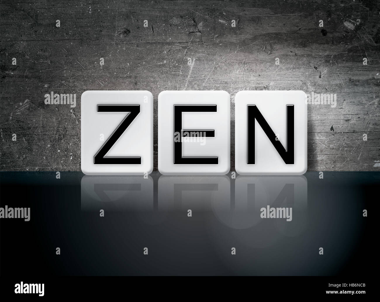 The word "Zen" written in white tiles against a dark vintage grunge ...