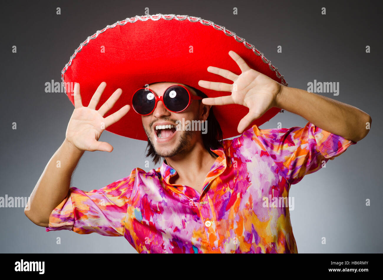 Young mexican man wearing sombrero Stock Photo - Alamy