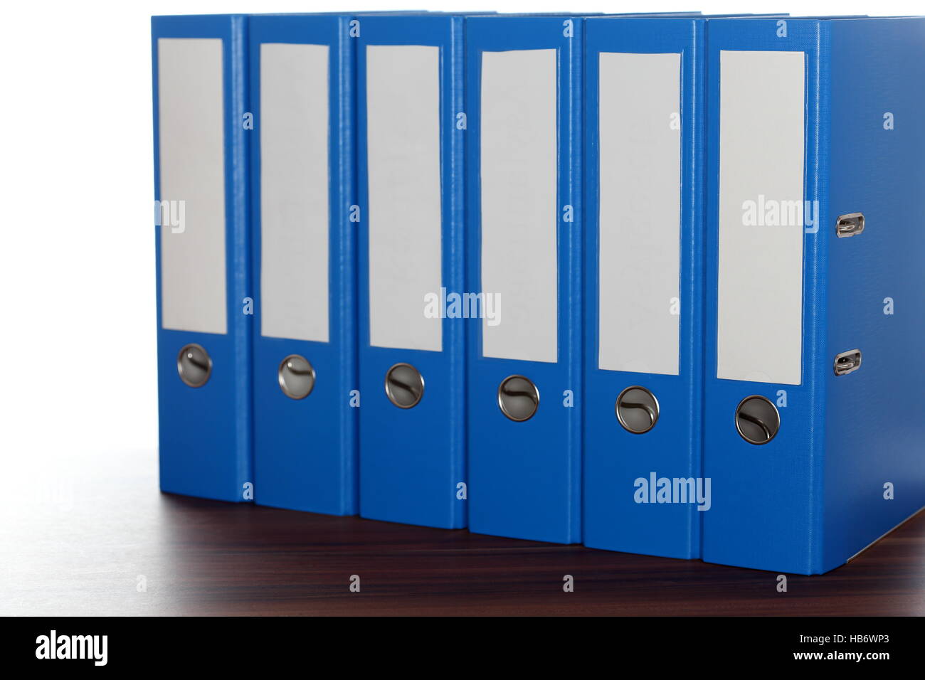 six blue folders Stock Photo - Alamy