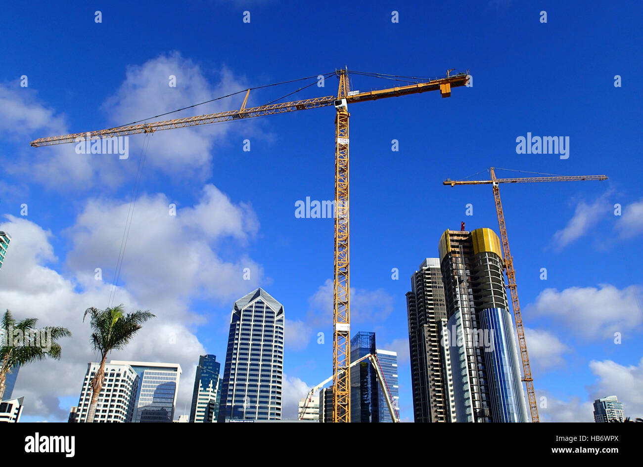 Huge construction cranes for skyscraper construction Stock Photo - Alamy