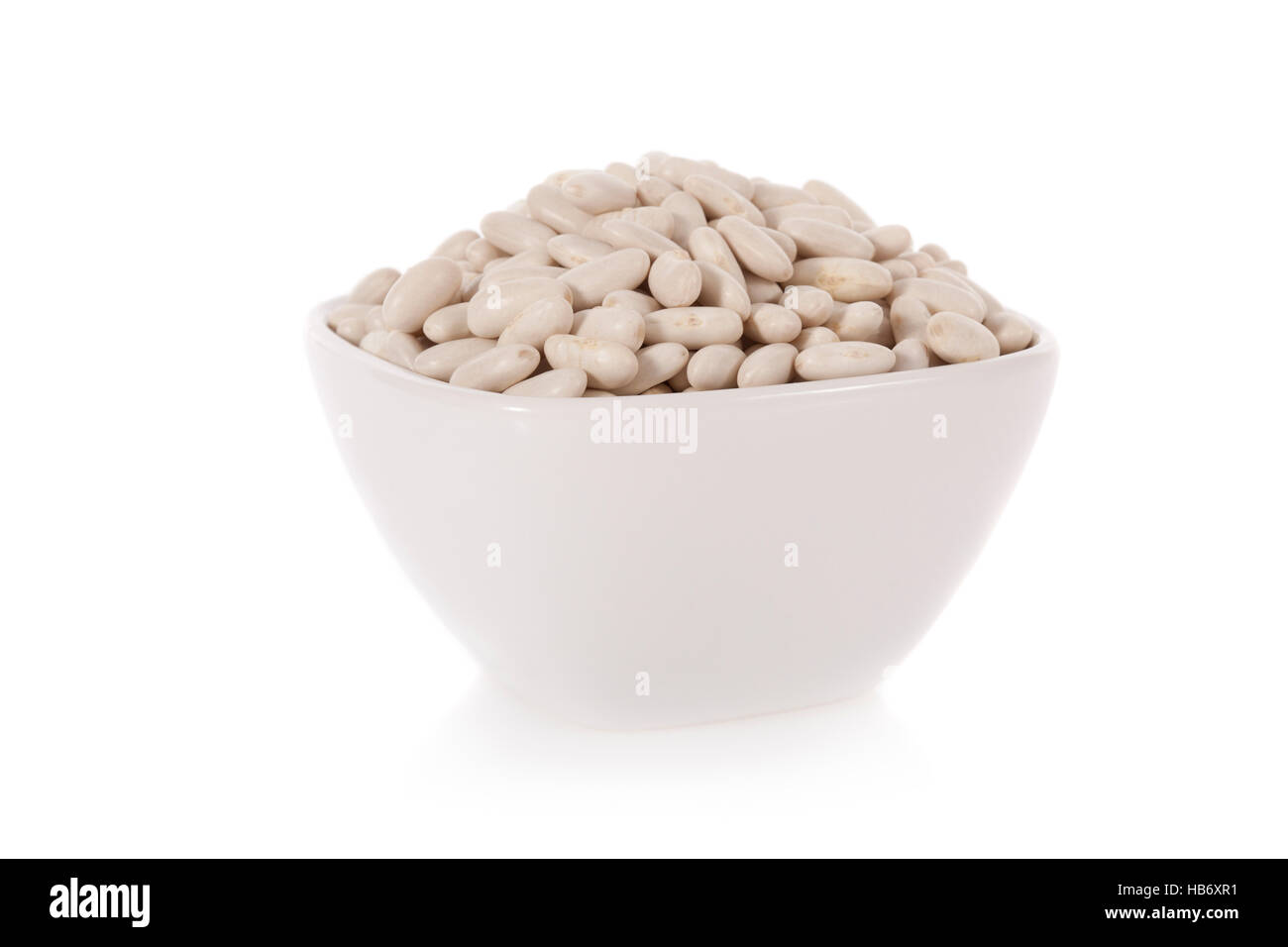 Haricot or Cannellini beans in a bowl isolated on white background ...