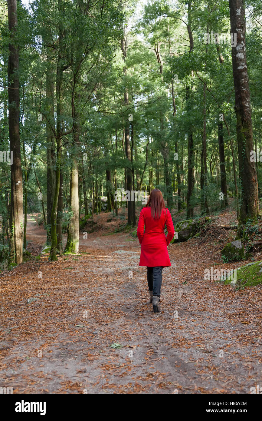 Woman walking alone hi-res stock photography and images - Alamy