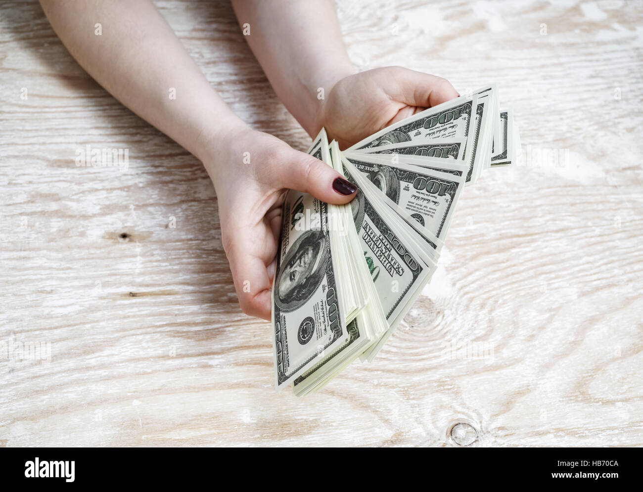 Money in hands Stock Photo - Alamy