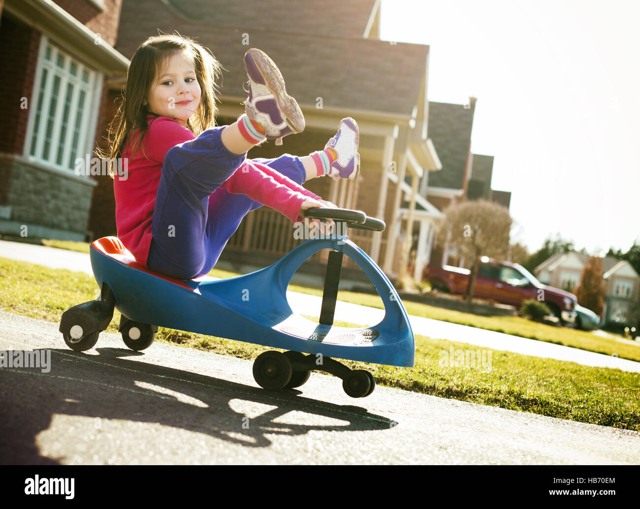 girl riding scooter Stock Photo - Alamy