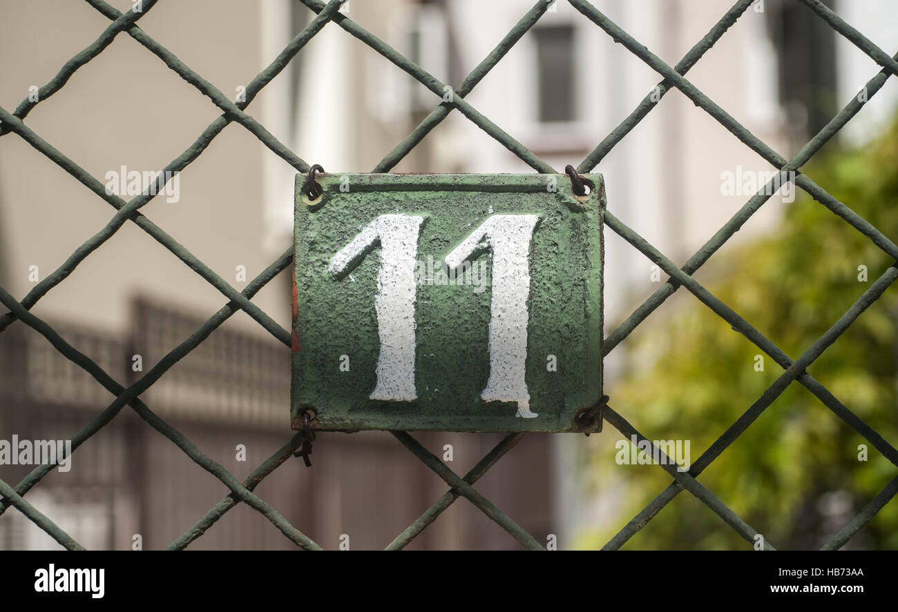 Old retro cast iron plate number 11 Stock Photo - Alamy