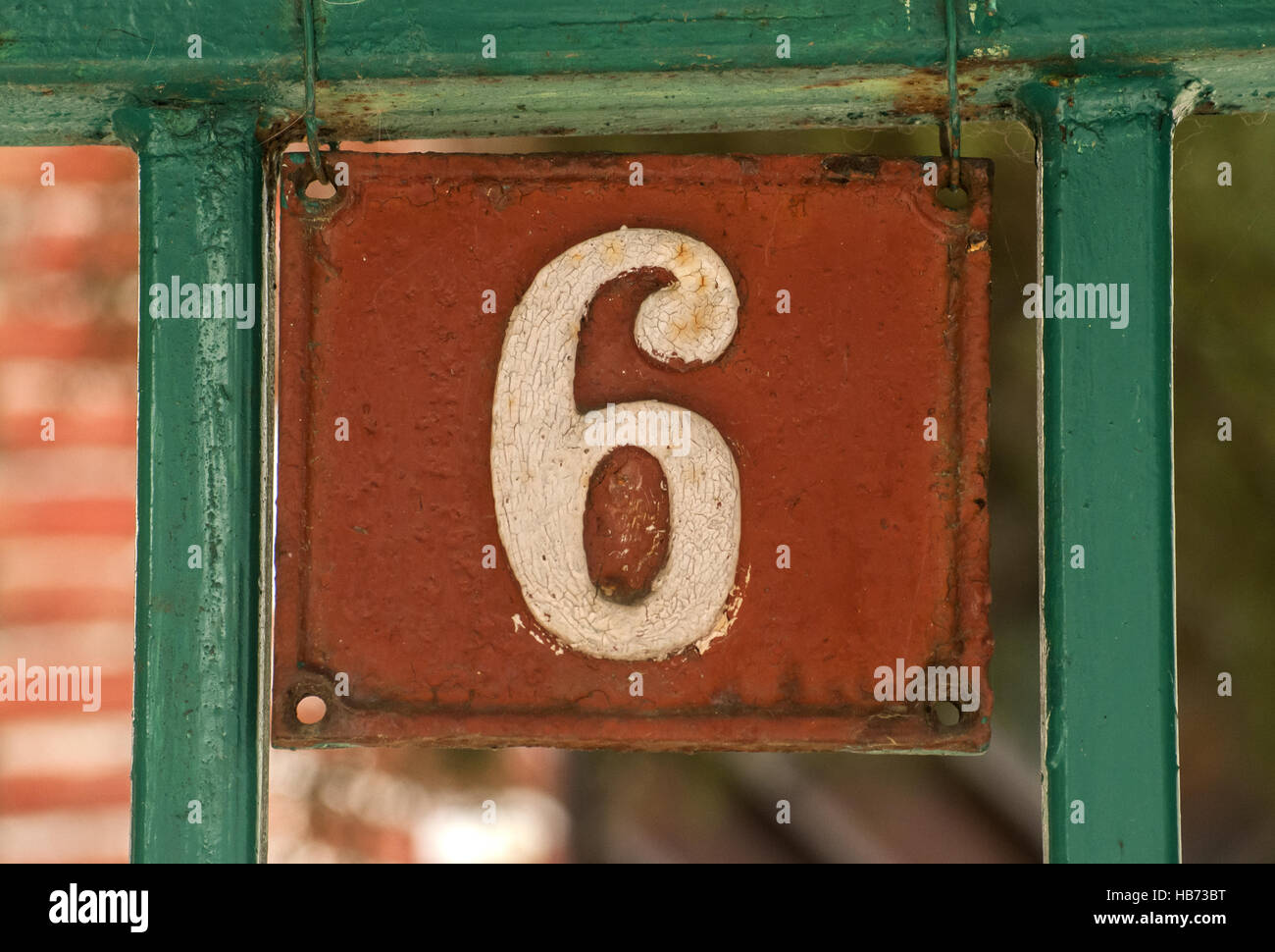 Old retro cast iron plate number 6 Stock Photo - Alamy