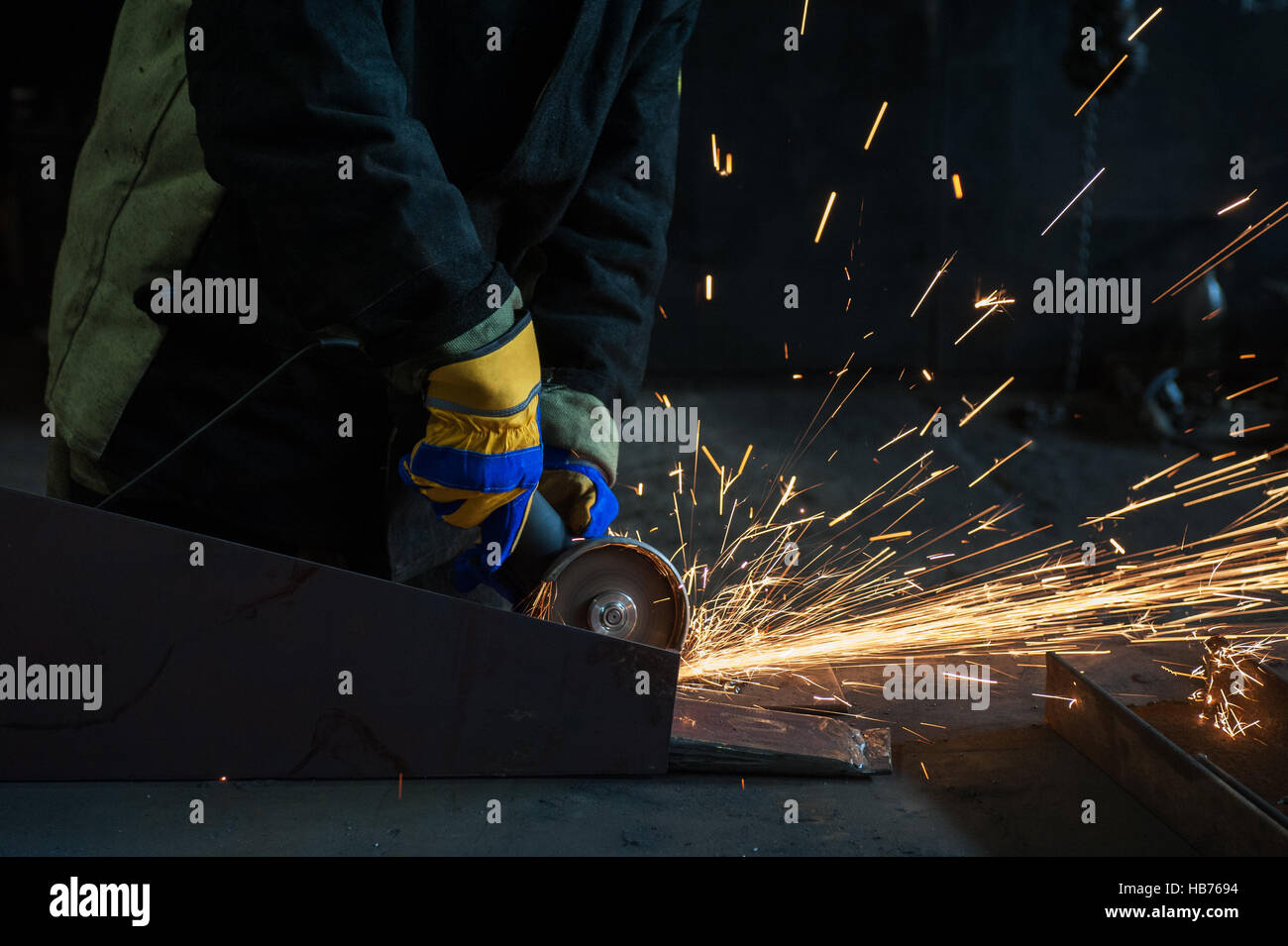 worker welding metal Stock Photo - Alamy
