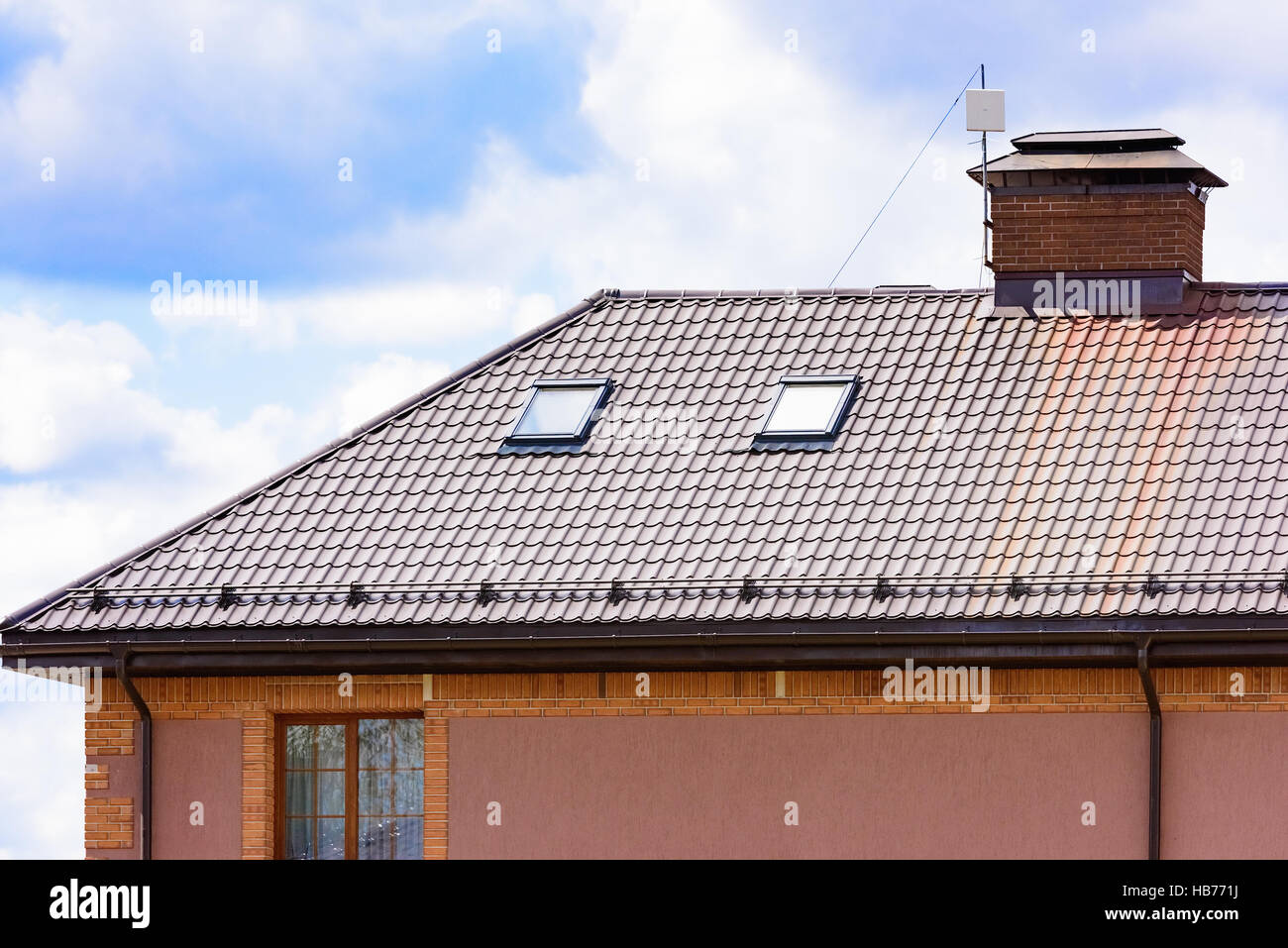 house with a gable roof window Stock Photo - Alamy
