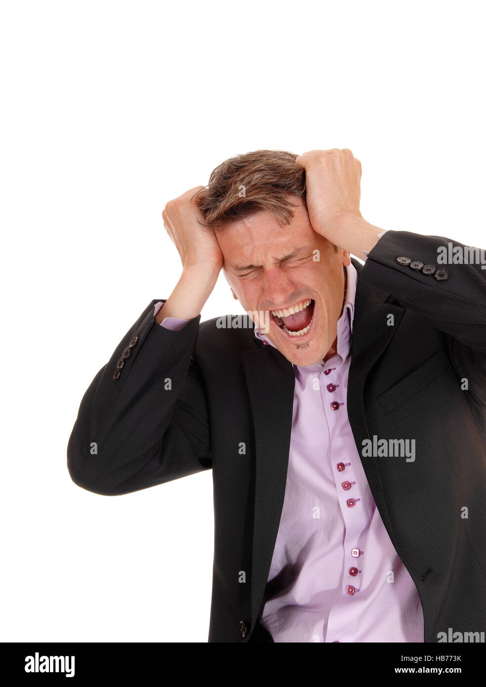 Screaming man scratching his head Stock Photo - Alamy