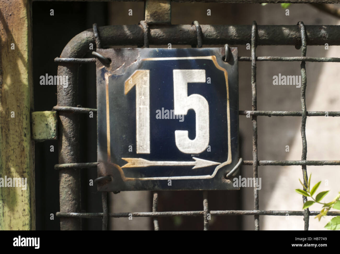 Weathered enameled plate number 15 Stock Photo - Alamy