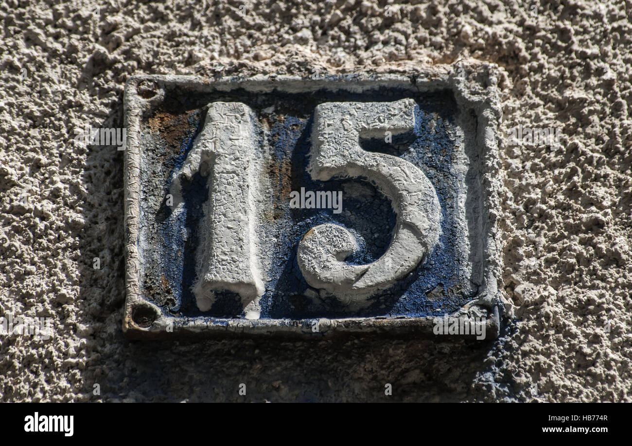 Old retro cast iron plate number 15 Stock Photo - Alamy