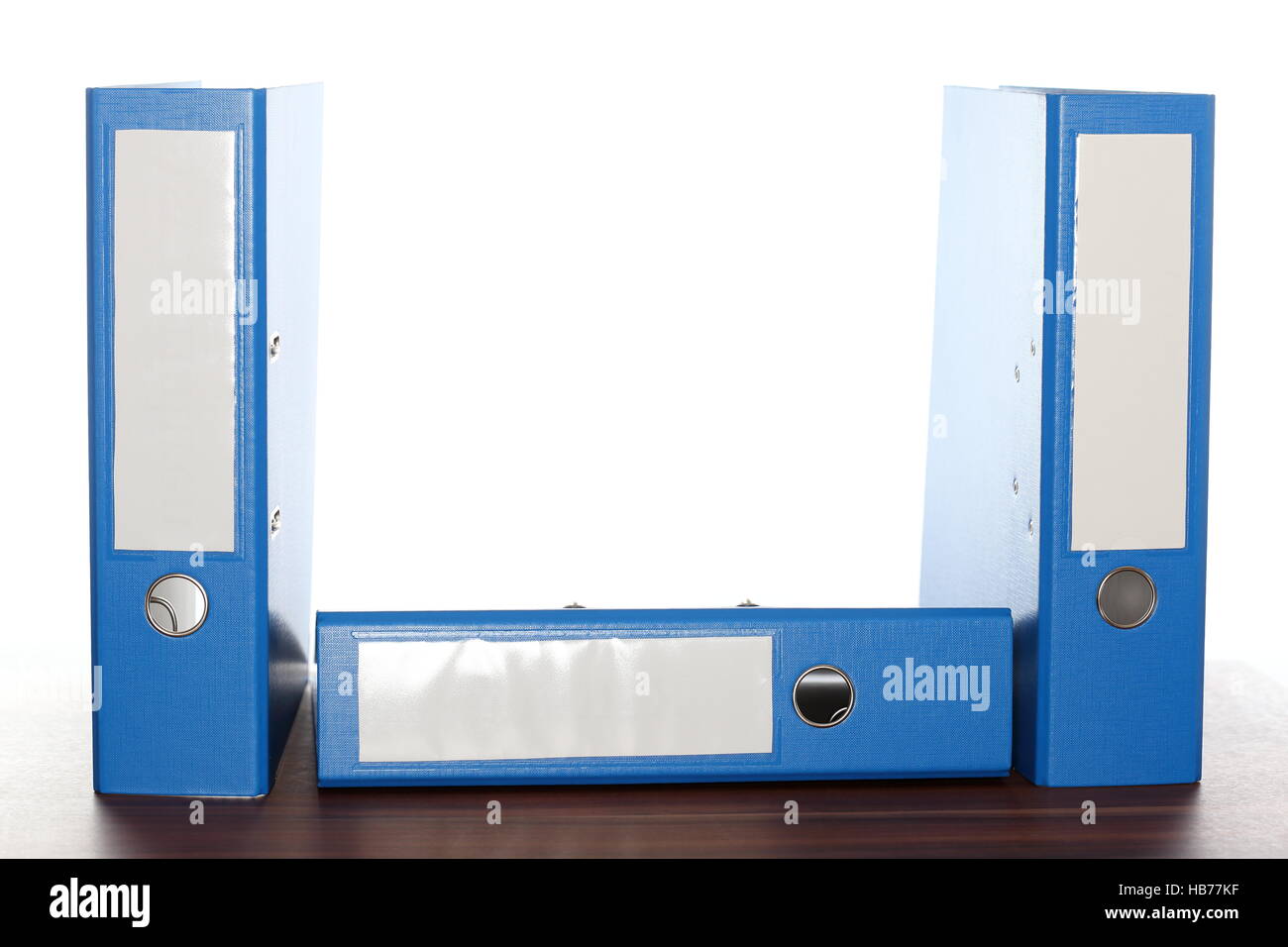 three file folders on desk Stock Photo - Alamy