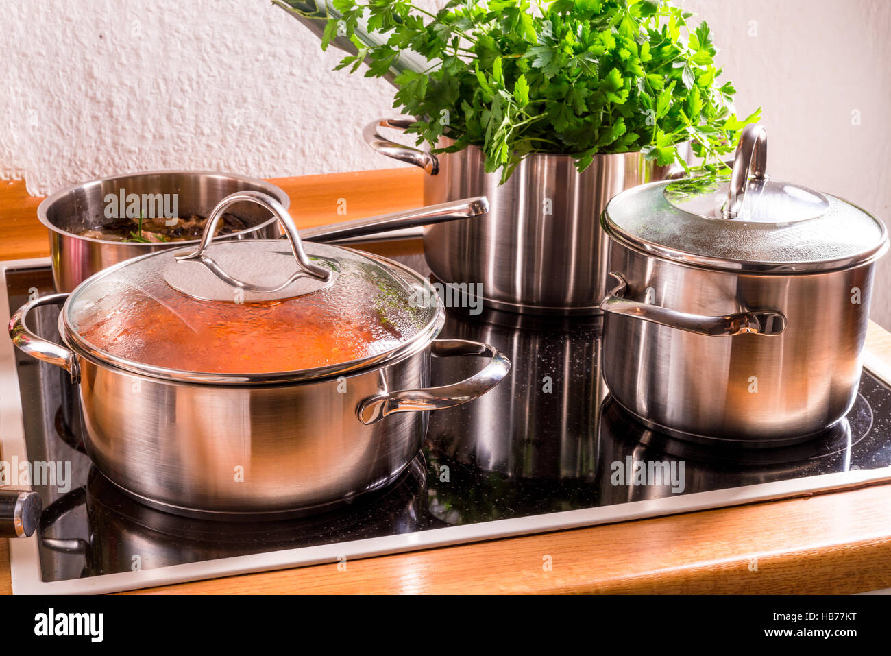 cooking pots on the stove Stock Photo - Alamy