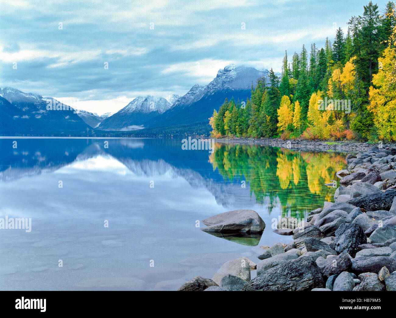 fall colors and mountains along lake mcdonald in glacier national park ...