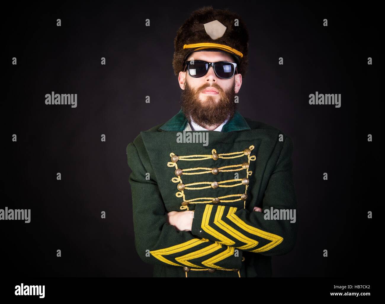 Beared young man in interesting costume posing Stock Photo - Alamy
