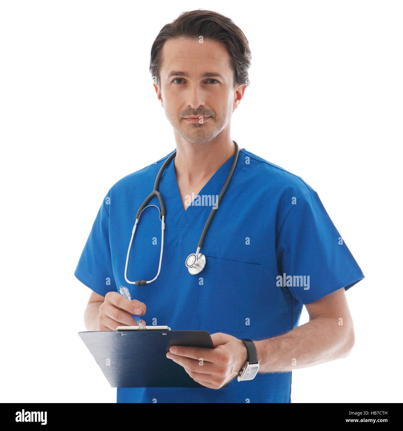 Portrait of young doctor in blue uniform isolated on white background ...
