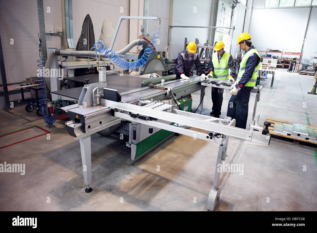 CNC machine shop with lathes, technicians and workers Stock Photo - Alamy