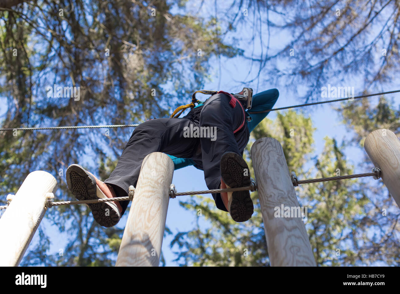 young woman having fun in an outdoor adventure park Stock Photo - Alamy