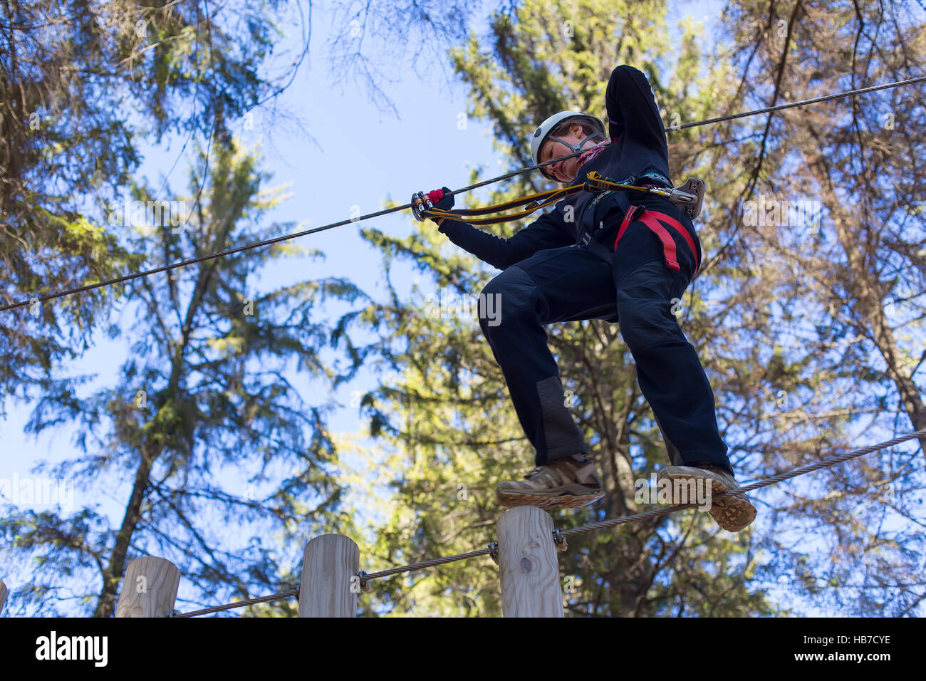 young woman having fun in an outdoor adventure park Stock Photo - Alamy