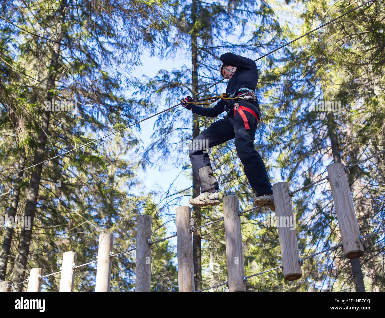 young woman having fun in an outdoor adventure park Stock Photo - Alamy