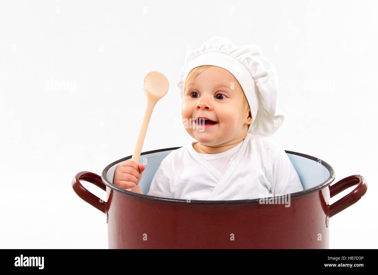 cute little baby sitting in a huge pot Stock Photo - Alamy