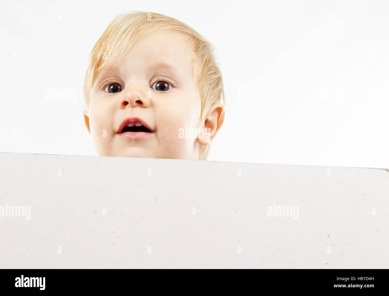 adorable child with blank advertising banner Stock Photo - Alamy