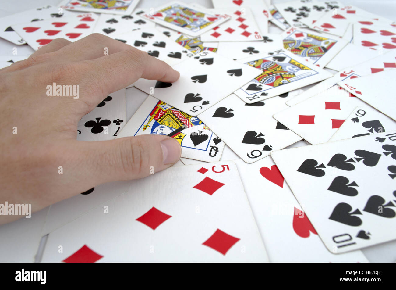 Playing cards in hand Stock Photo - Alamy