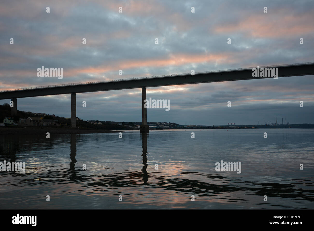 The Cleddau bridge at Pembroke Dock silhouetted against the pink and ...