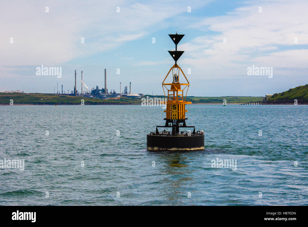South Hook south cardinal marker with Pembrokeshire refinery and Angle ...