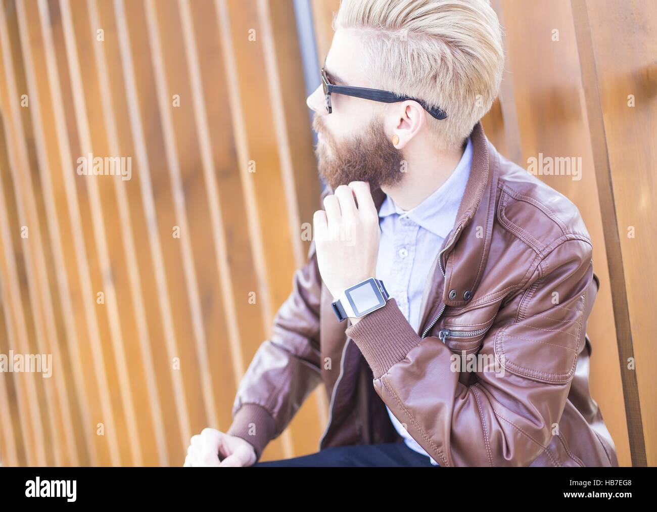 Fashionable young man representing the new generation's hipster style ...