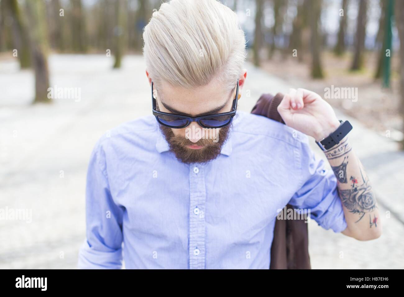 New generation style represented by blond hipster guy Stock Photo - Alamy