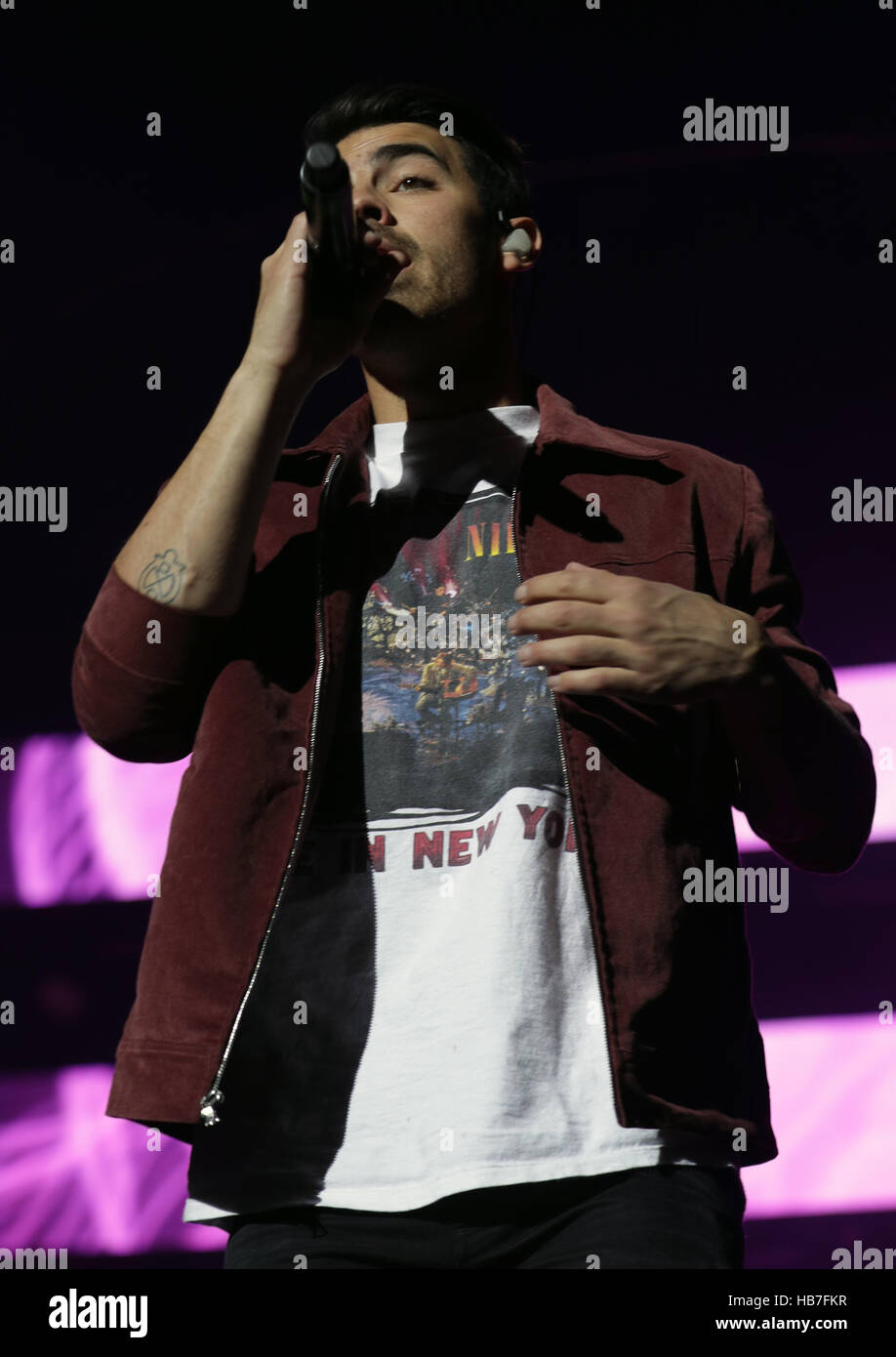 Joe Jonas of DNCE performing on stage on stage at Capital's Jingle Bell ...