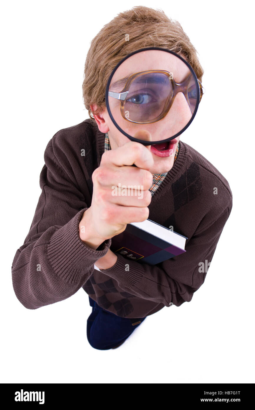 nerd guy with magnifier and book Stock Photo - Alamy