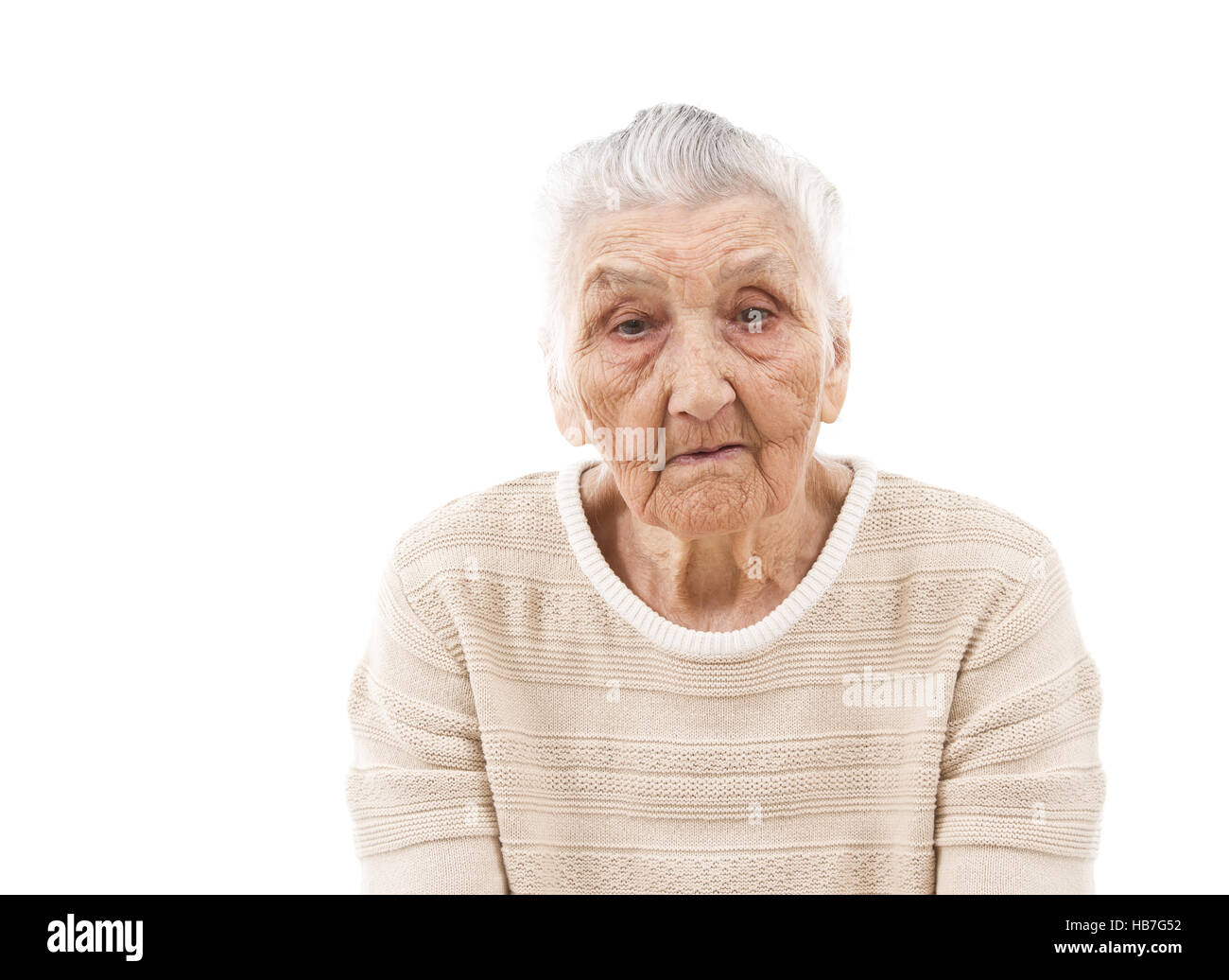 sad old woman contemplating in front of an isolated background Stock ...