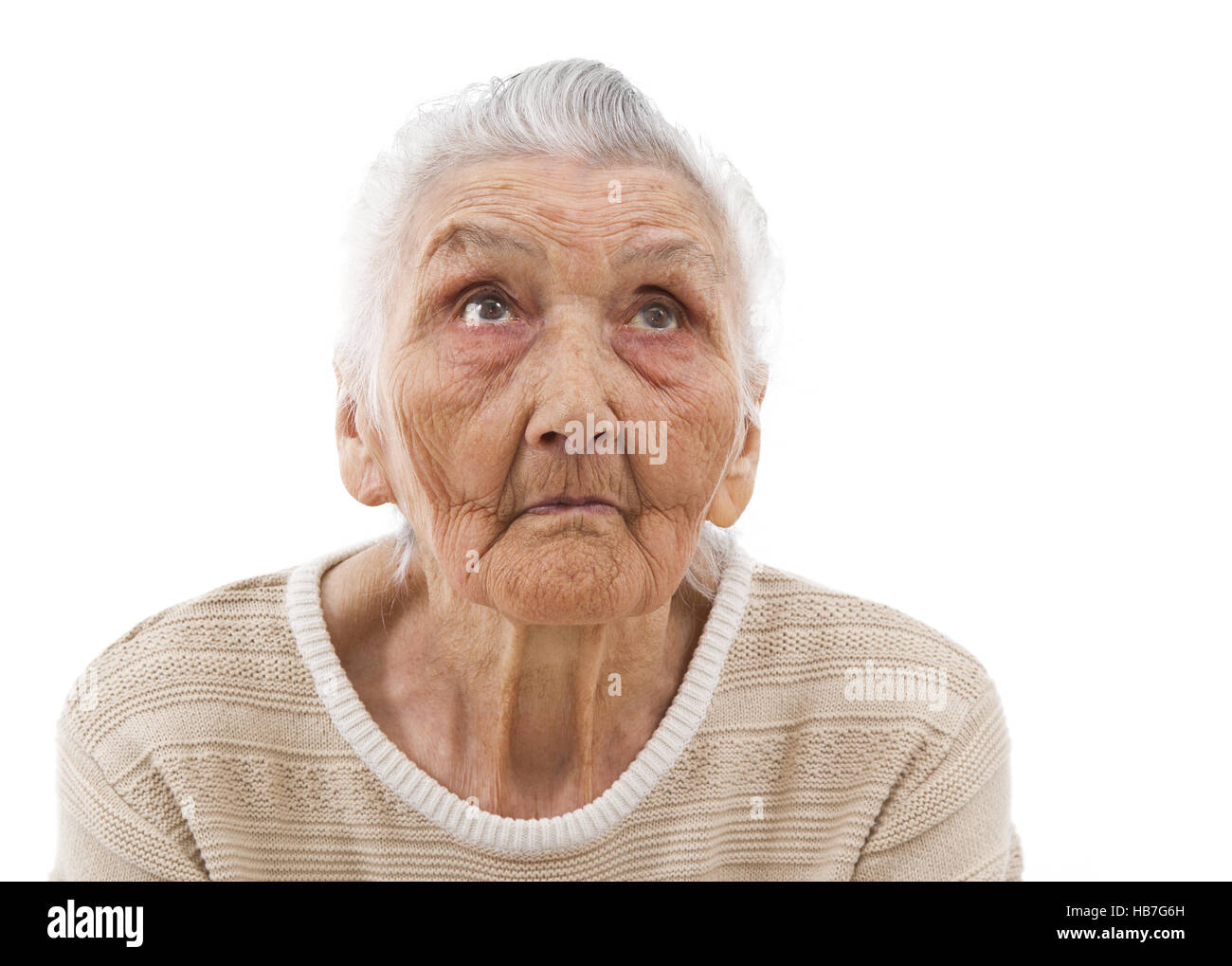 very old lady contemplating on an isolated background Stock Photo - Alamy
