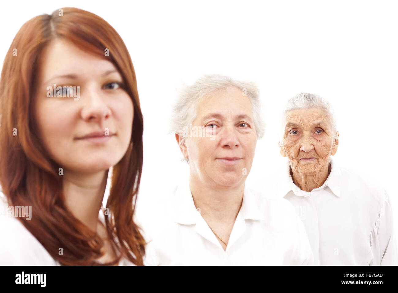 three women from three generations standing in white generations in ...