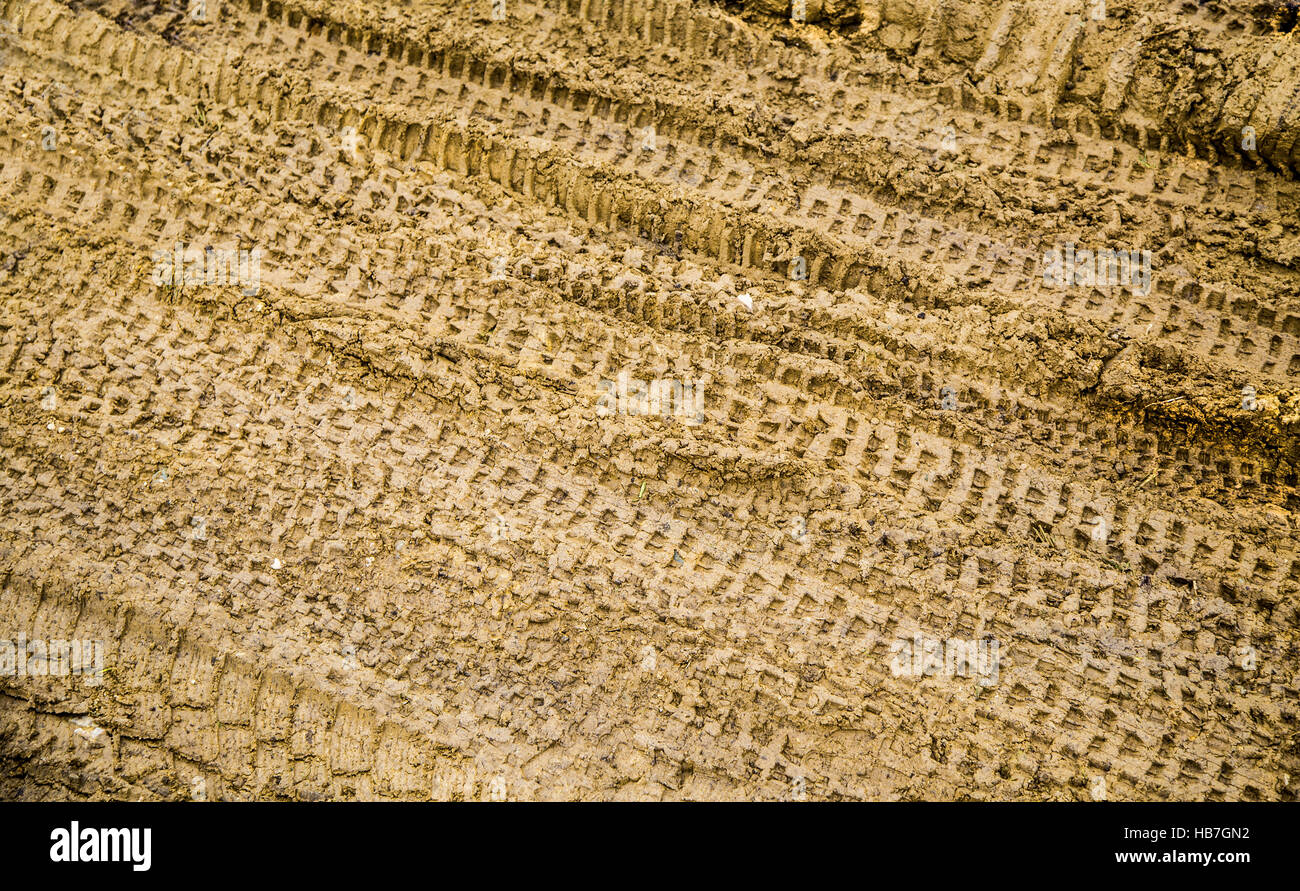 tire tracks in mud as background and texture Stock Photo - Alamy