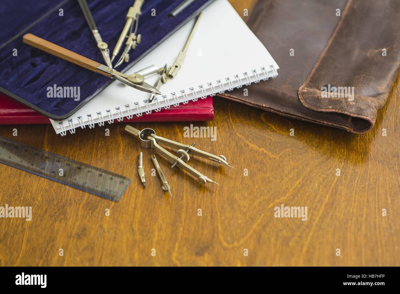 Scale and many other architectural tools with notebook Stock Photo - Alamy
