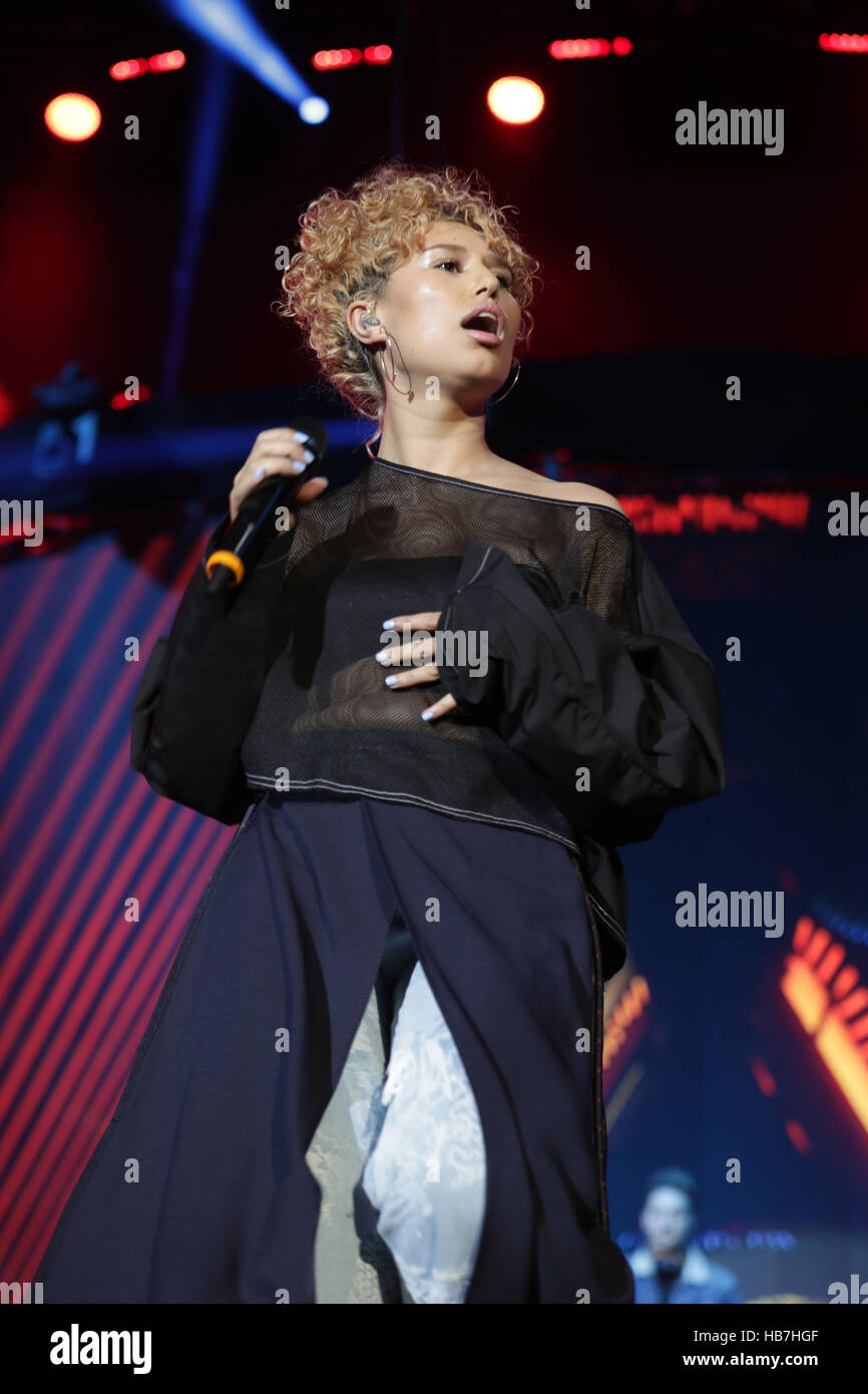 Singer Raye performs on stage with Jonas Blue during Capital's Jingle ...